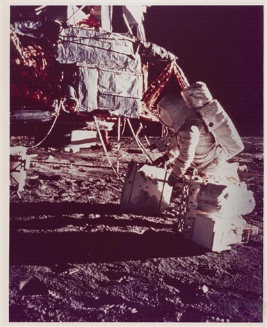 Apollo 12 Alan Bean transporting lunar experiments to Ocean of Storms ...